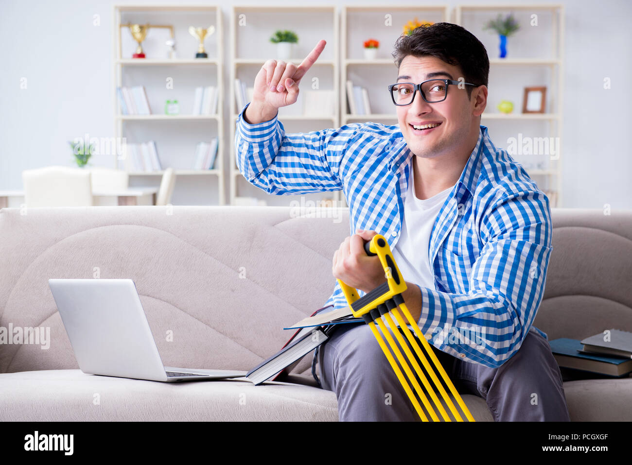 Student exercising while preparing for exams Stock Photo - Alamy