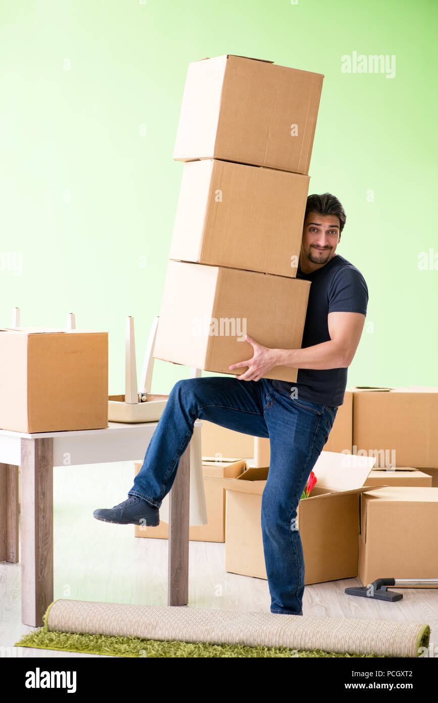 Delivery man falling stack boxes hi-res stock photography and images ...