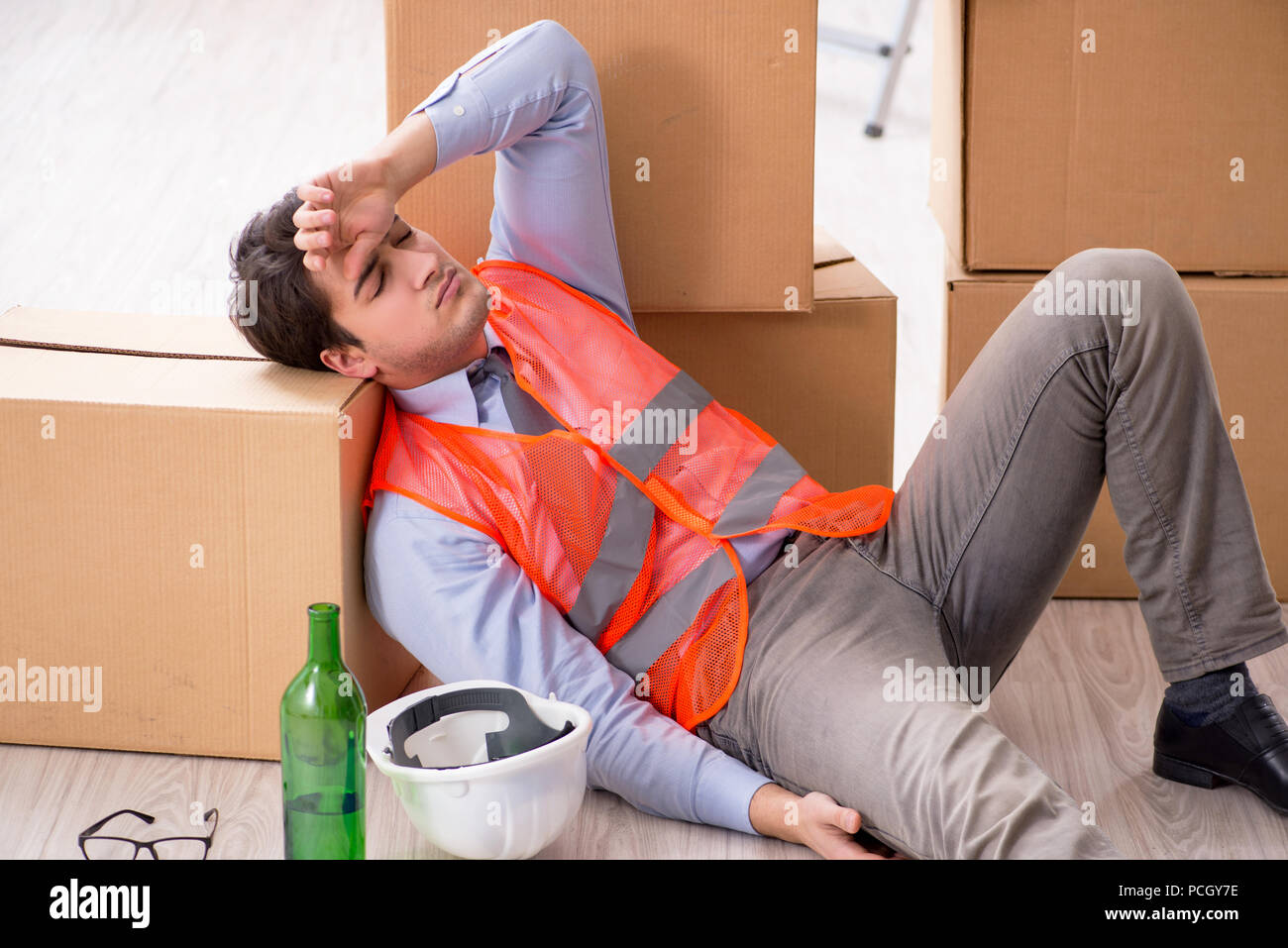 Delivery man drunk at work Stock Photo - Alamy