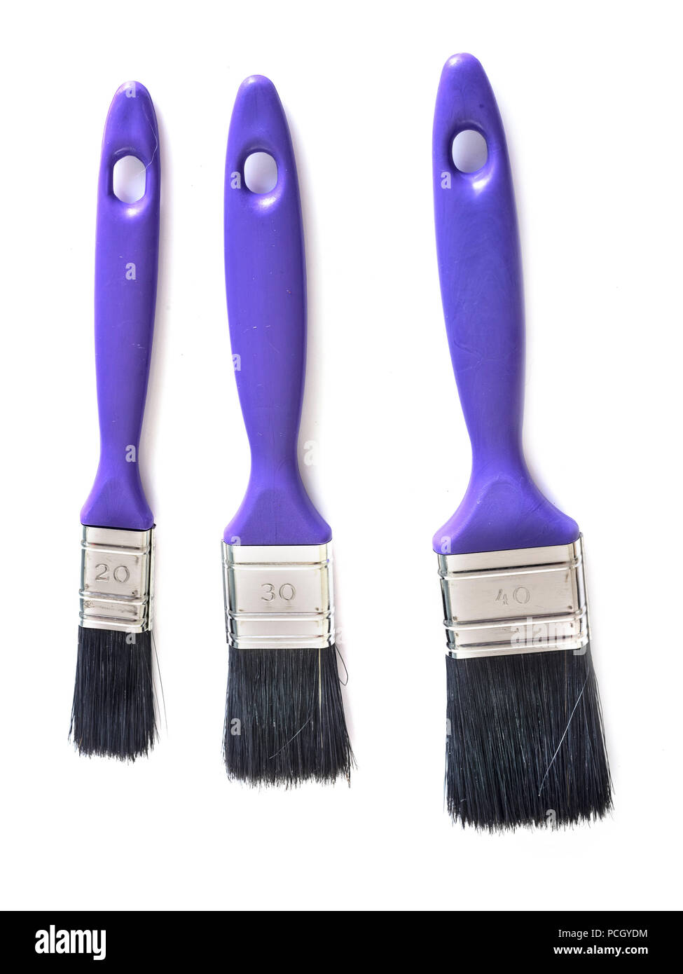 colorful paintbrush in front of white background Stock Photo - Alamy