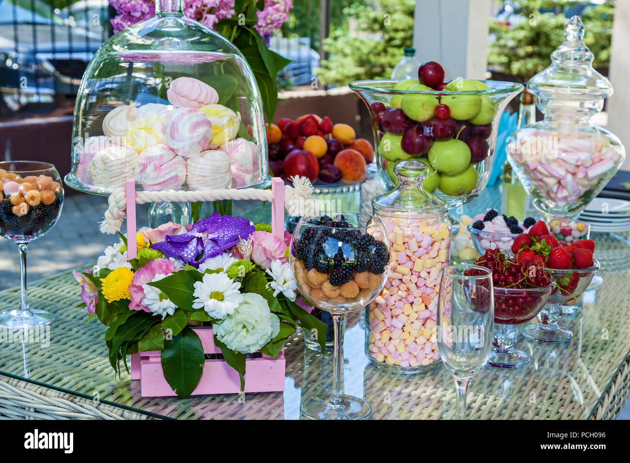 Candy bar of fruits, berries and marshmallows for a party. Festive ...