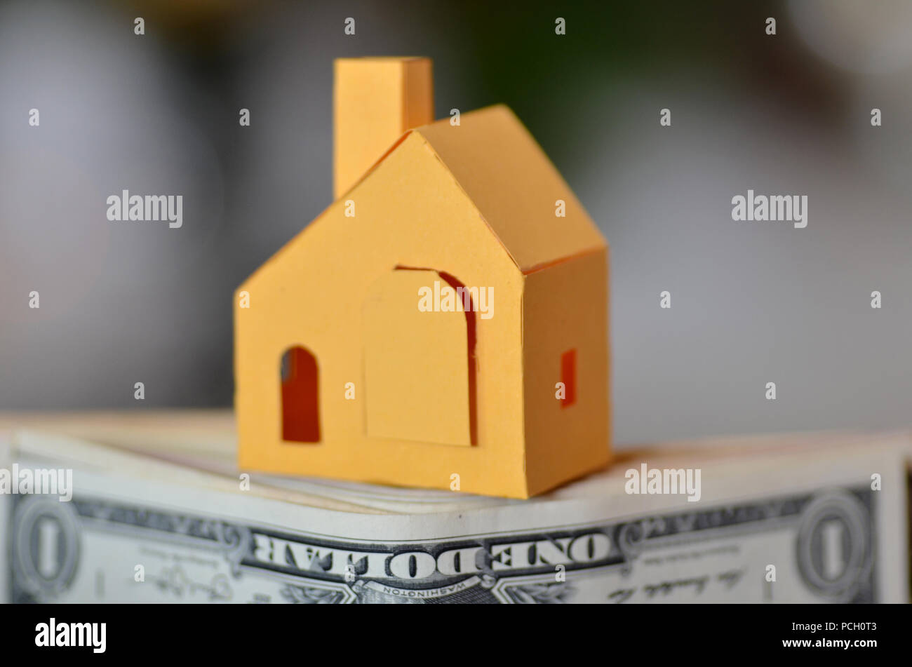 House and money. Home concept Stock Photo - Alamy