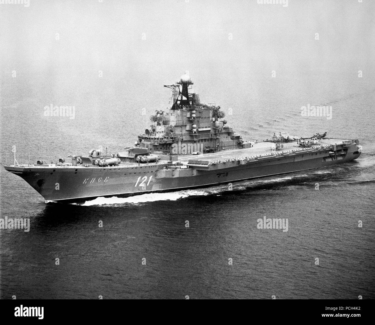 An aerial port bow view of the Soviet aircraft carrier KIEV underway ...