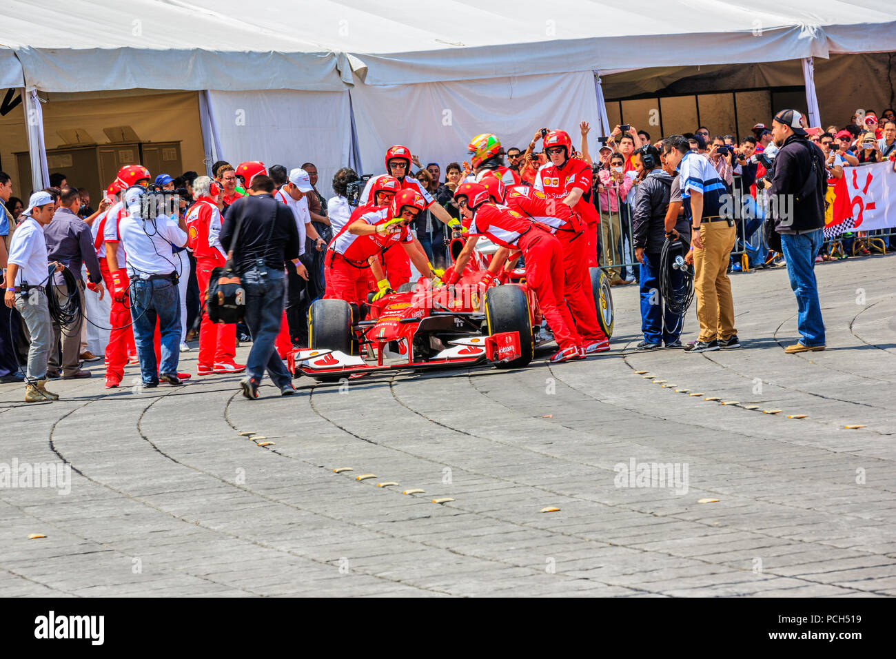 Mexico City, Mexico - July 08, 2015: Pit Crew Keeping the car in to the ...