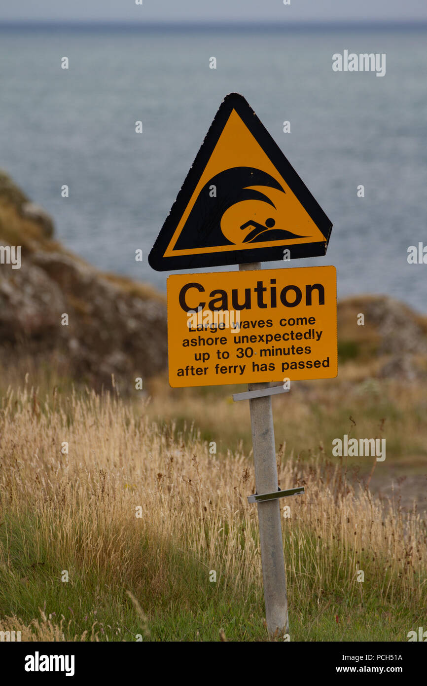 Caution sign waves from ferry hi-res stock photography and images - Alamy