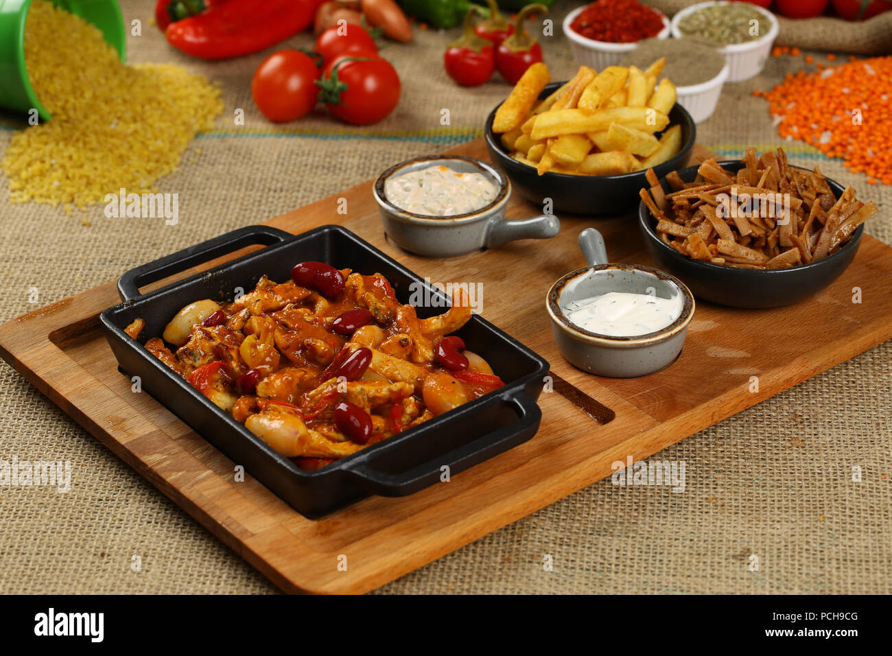 Chicken Meat Saute with Tomato Sauce Stock Photo - Alamy