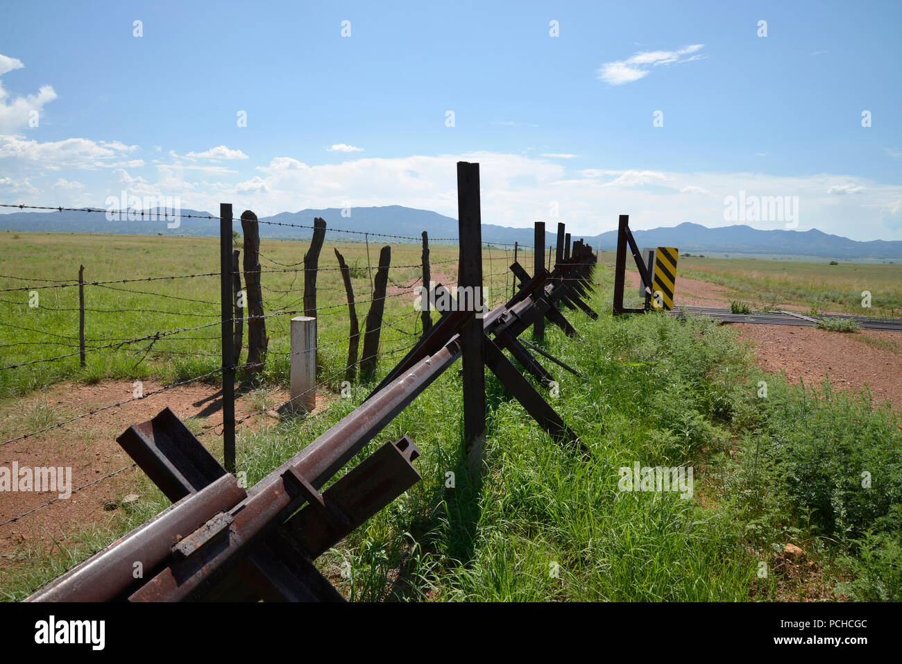 A fence indicates the international border between Sonora, Mexico, and ...