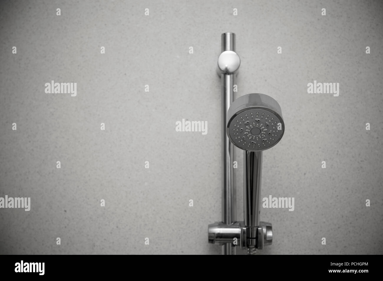 Head shower with wall background in bathroom Stock Photo - Alamy