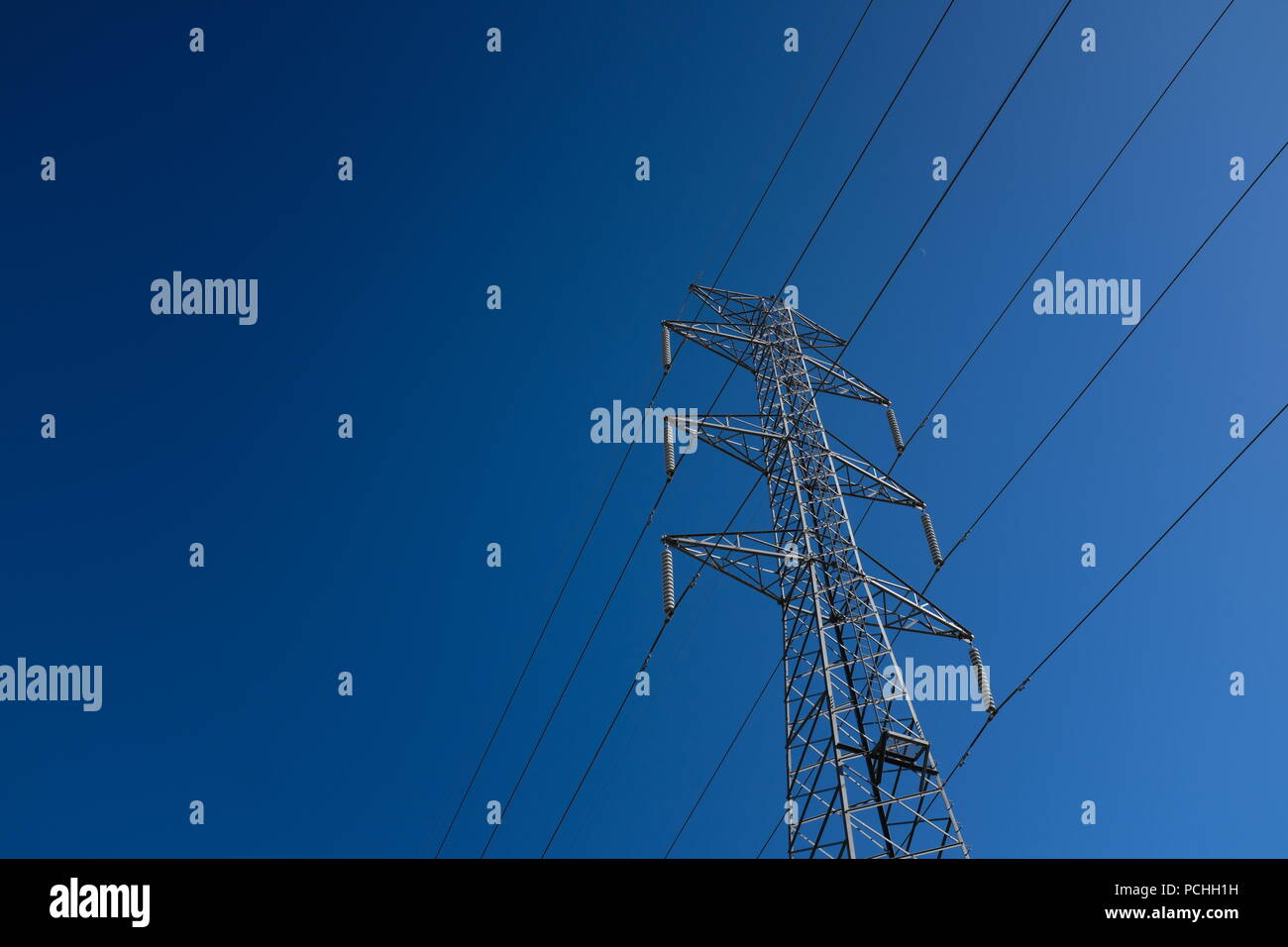 Overhead power Lines and towers going across the Australian landscape ...