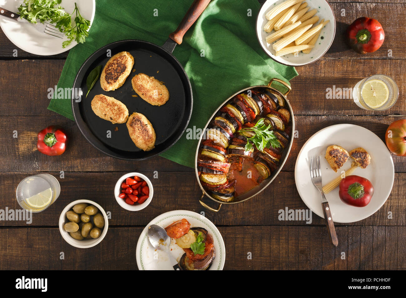 Vegetarian dinner table concept. Different vegetarian food on wooden ...
