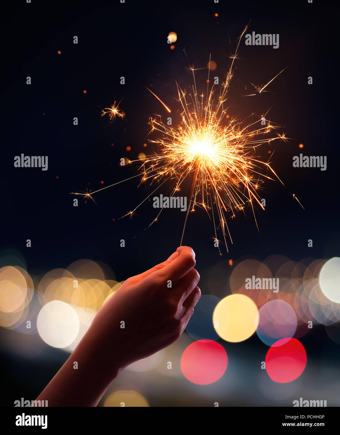 Hand fire light sparkler hi-res stock photography and images - Alamy