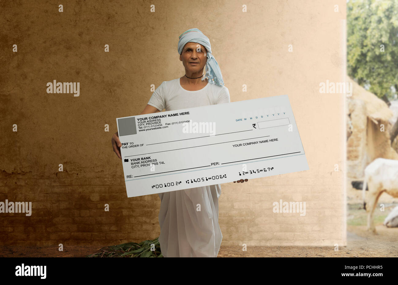 A man holding cheque hi-res stock photography and images - Alamy