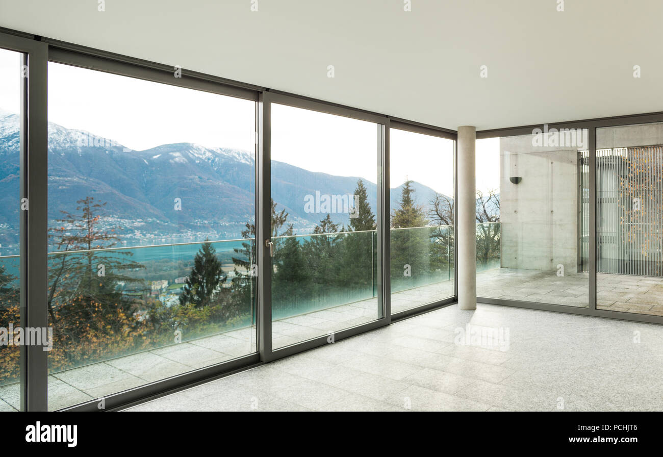 Modern architecture, wide apartment, room with windows Stock Photo - Alamy