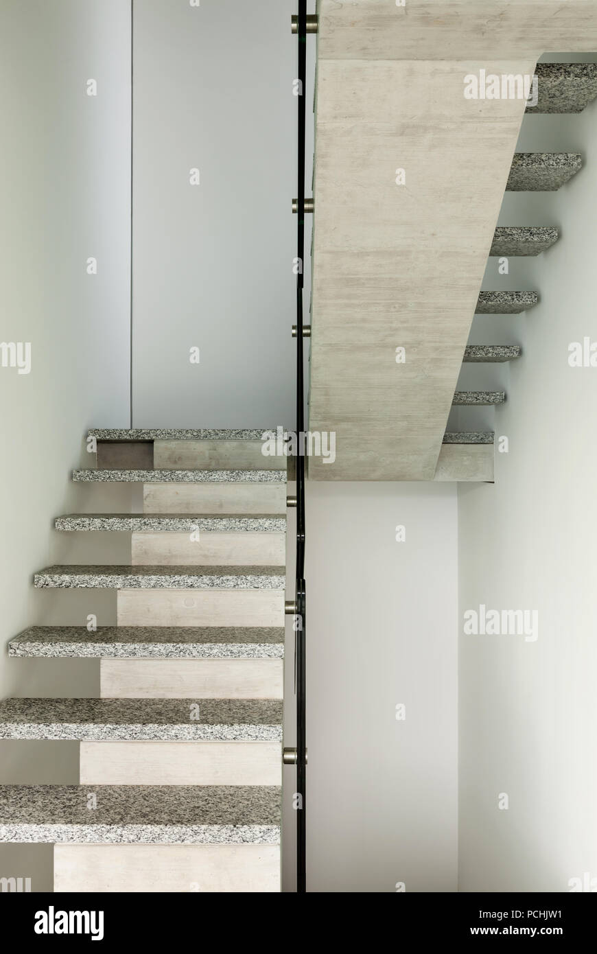 Modern building, granite staircase, interior Stock Photo - Alamy