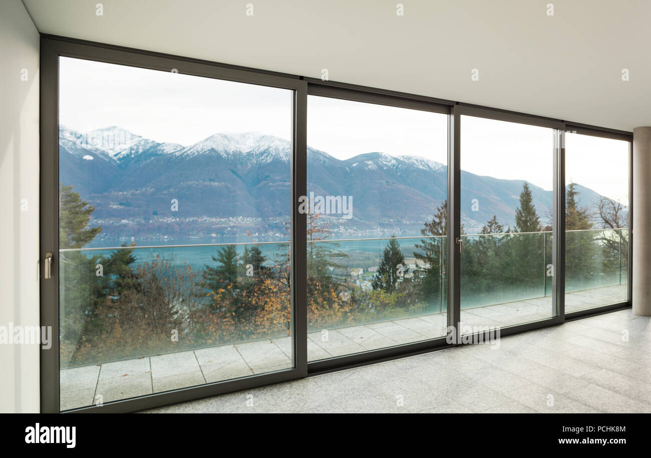 Modern architecture, wide apartment, room with windows Stock Photo - Alamy