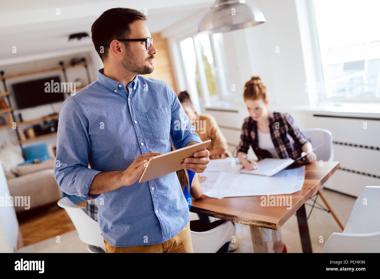 Male office manager using hi-res stock photography and images - Alamy