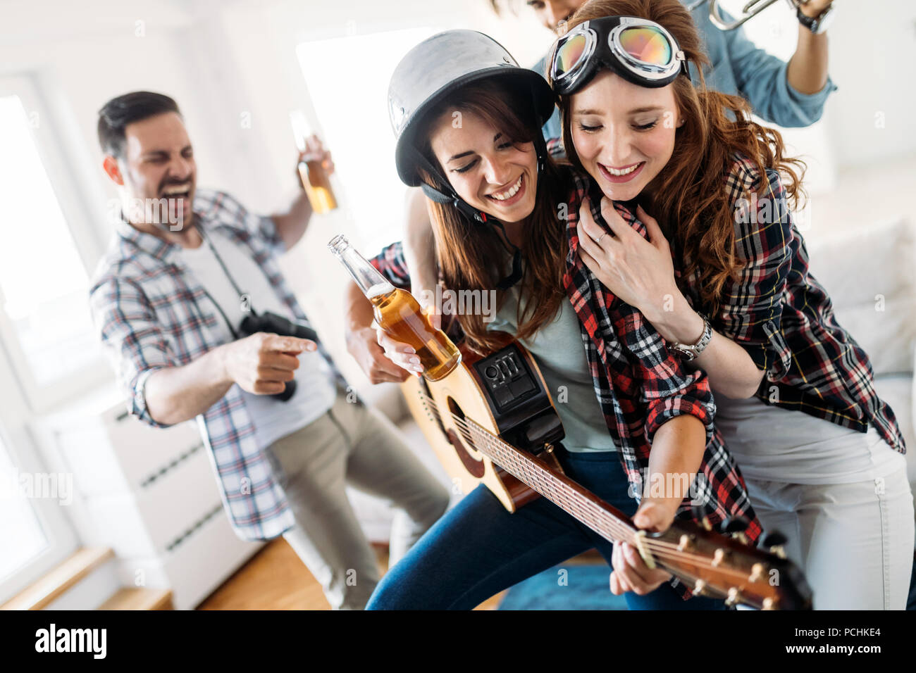 Group of girls playing together home hi-res stock photography and ...