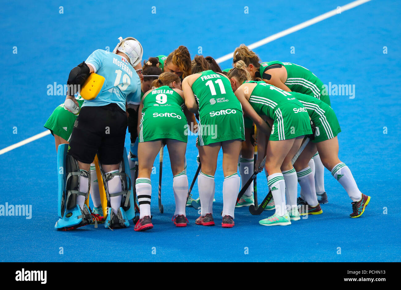 Ireland team in a huddle Stock Photo - Alamy
