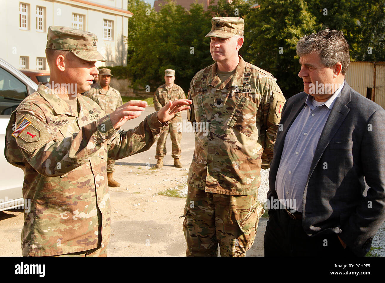 Col. Todd R. Wasmund, left, 1st Infantry Division Mission Command ...