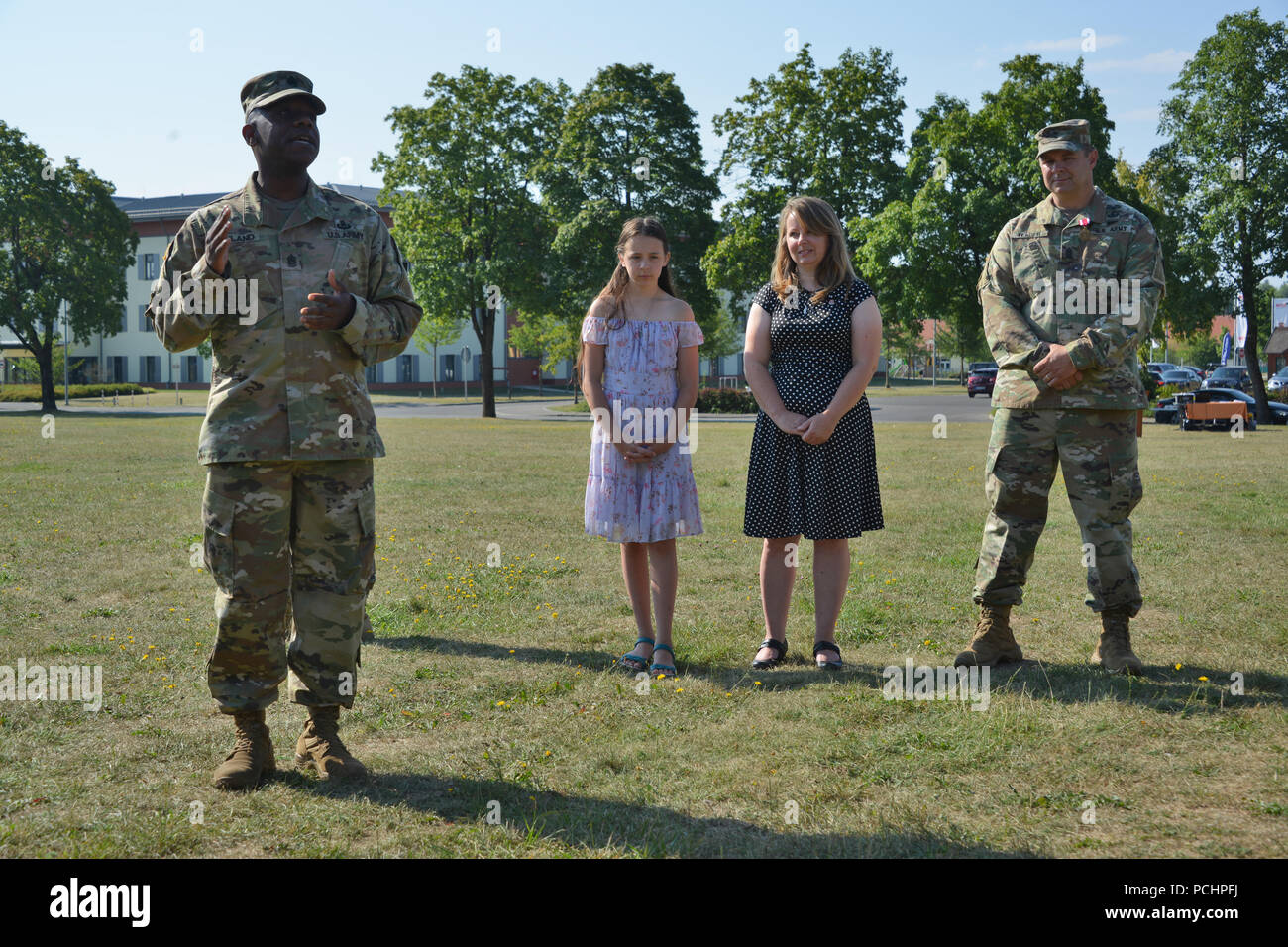 U.S. Army Command Sgt. Maj. Gregory D. Rowland, left, 2d Theater Signal Brigade senior enlisted ...