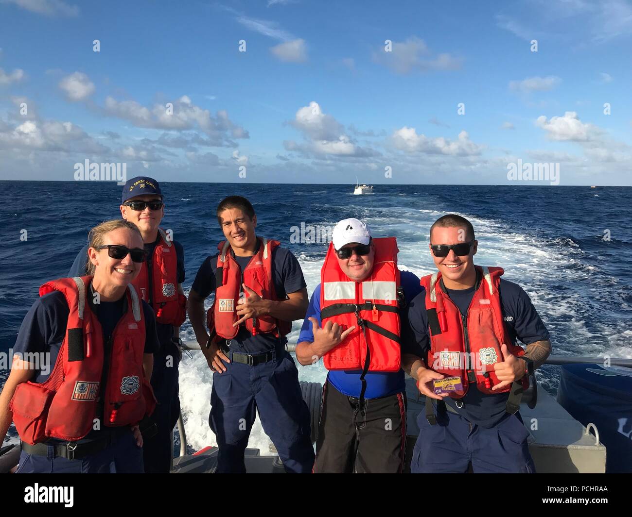 A Coast Guard Station Honolulu 45-foot Response Boat-Medium crew takes ...