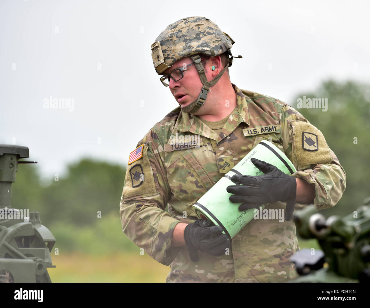 Sergeant Andrew Torres, a soldier assigned to Charlie Battery, 1st ...