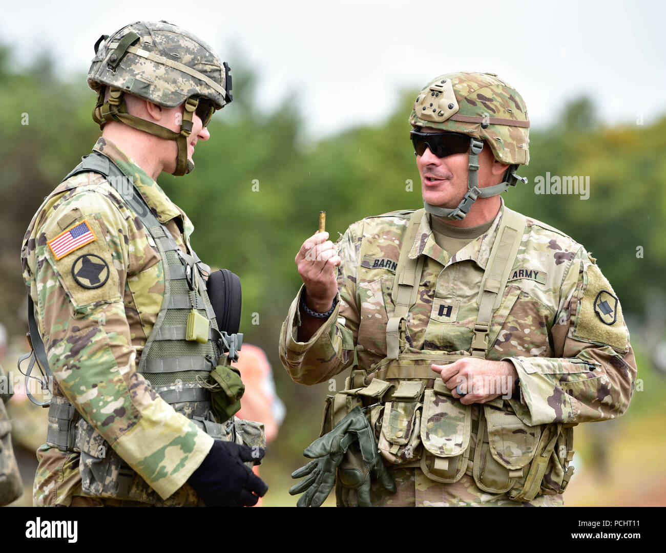 Cpt. Matthew Barnes, commander of Charlie Battery, presents Lt. Col ...
