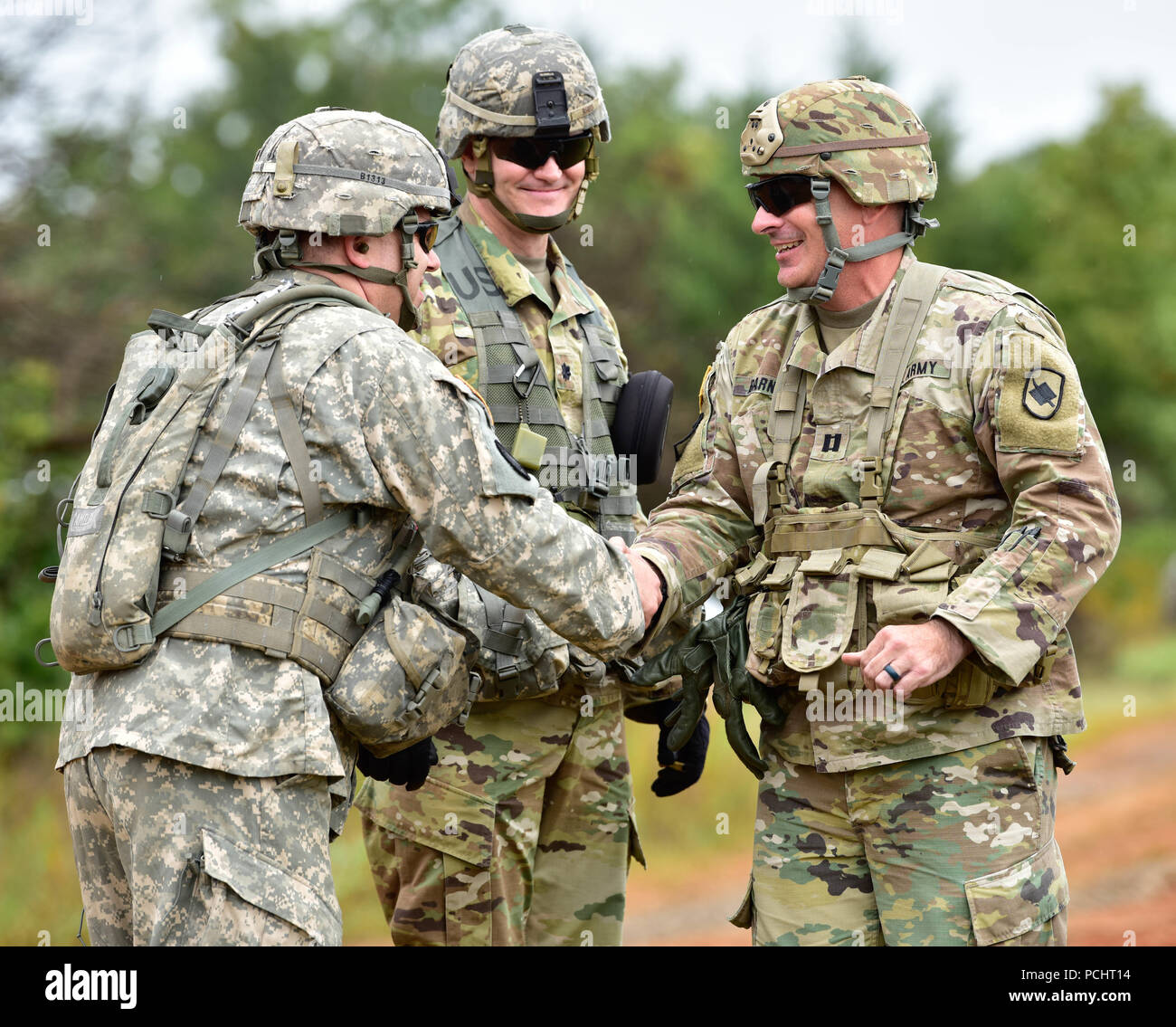 Cpt. Matthew Barnes, commander of Charlie Battery, presents Lt. Col ...