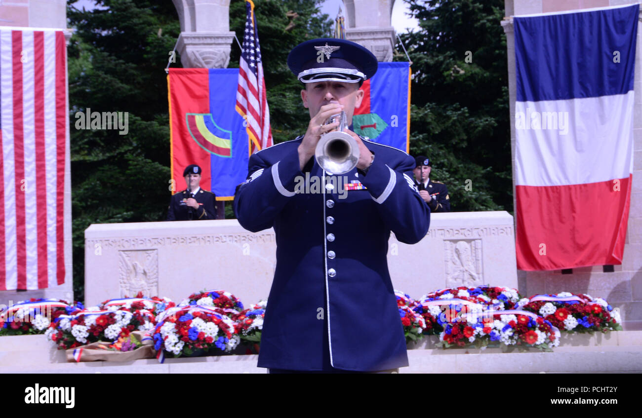 A United States Air Force bugler plays Taps during a ceremony at the ...