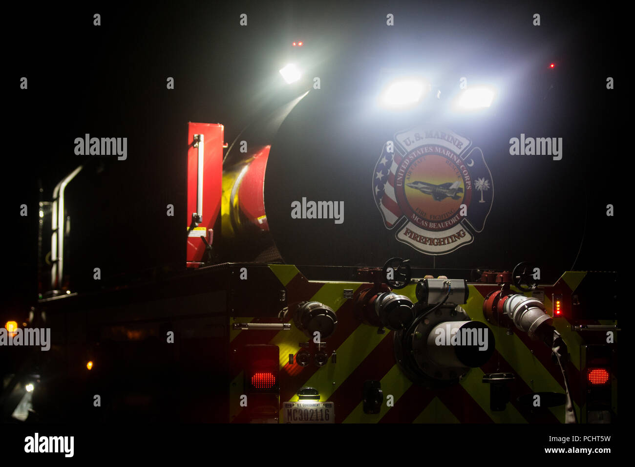 Aircraft Rescue and Fire Fighting (ARFF) Marines conduct a controlled ...