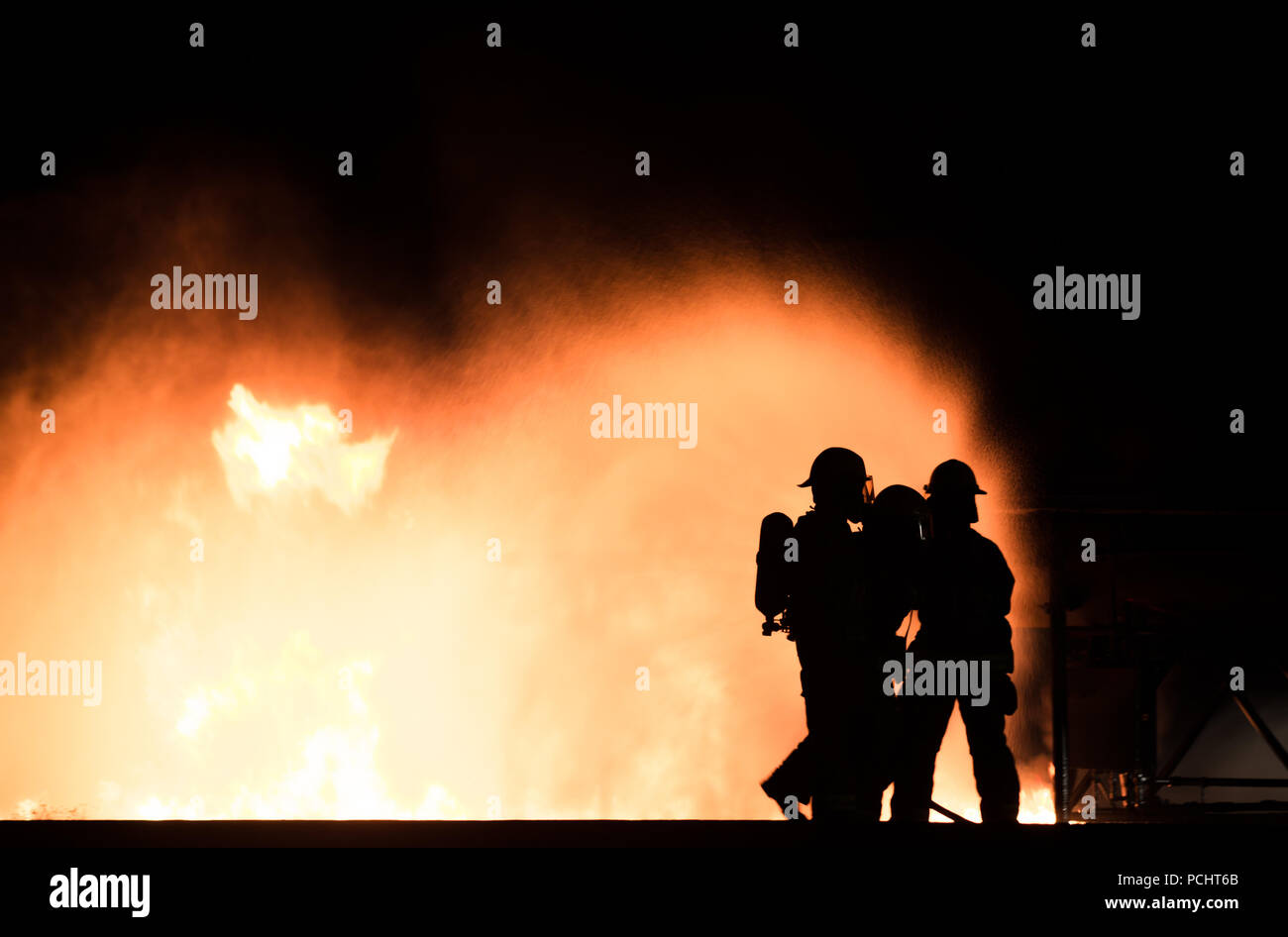 Aircraft Rescue and Fire Fighting (ARFF) Marines conduct a controlled ...