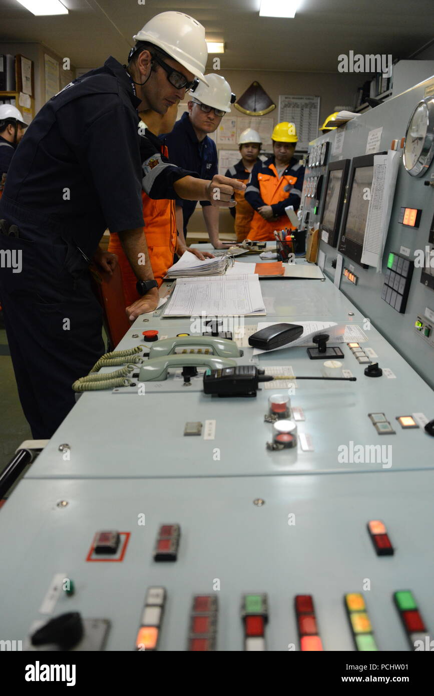 Petty Officer 2nd Class Bradley Martin and Petty Officer 1st Class ...