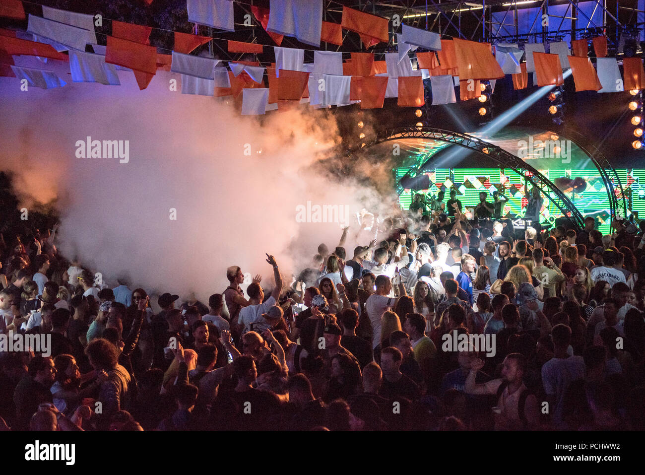 BONTIDA, ROMANIA - JULY 20, 2018: Crowd of people dancing and clubbing ...