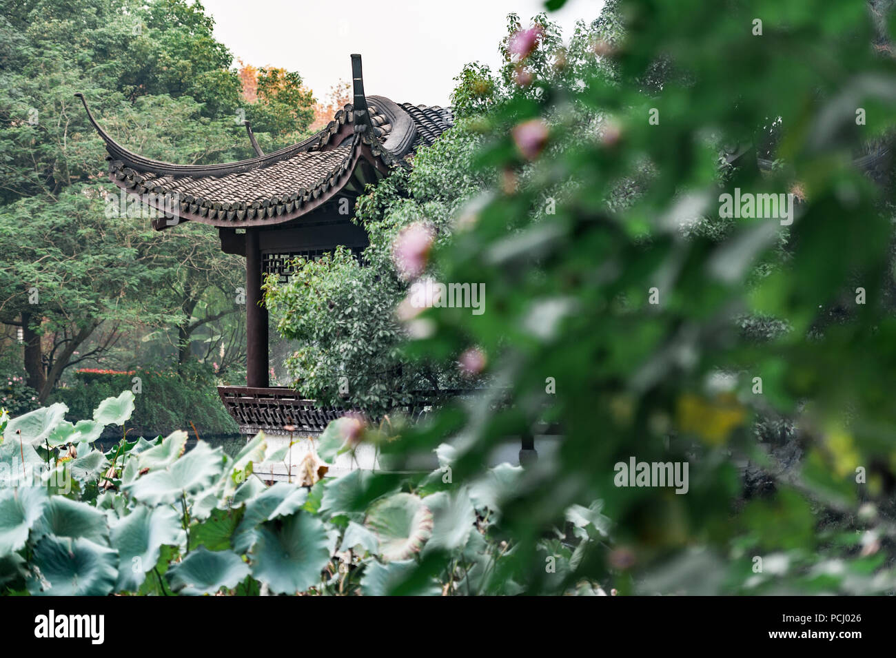 Traditional garden roof in Hangzhou, China. Decorative sculptures and ...