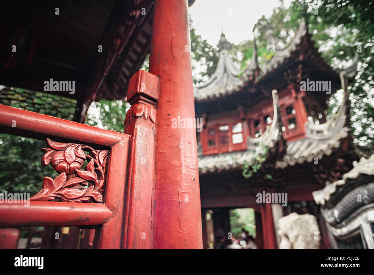 Traditional garden roof and ornate railing in Shanghai, China ...