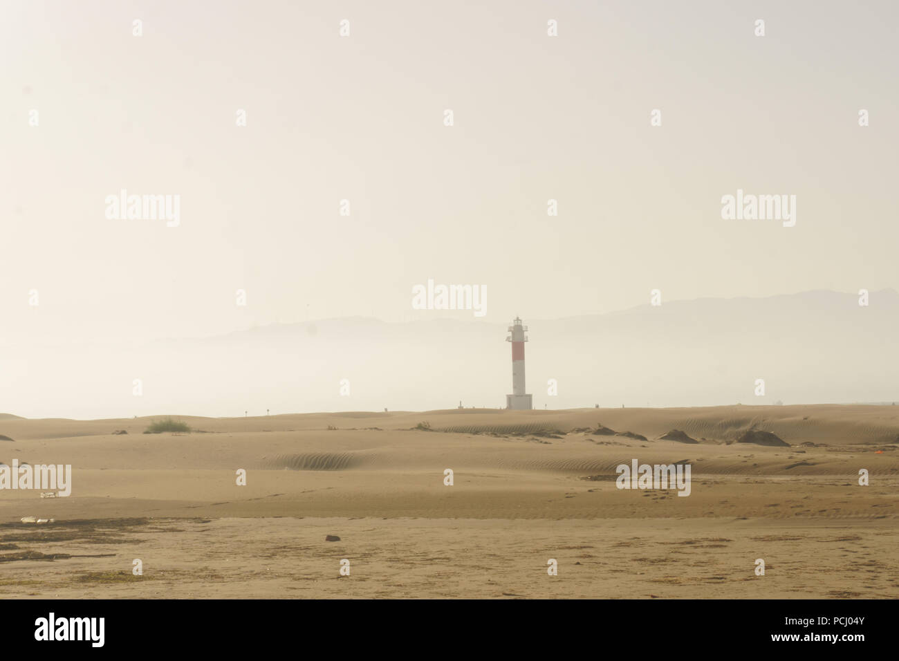 lighthouse in the desert near a beach in europe Stock Photo - Alamy