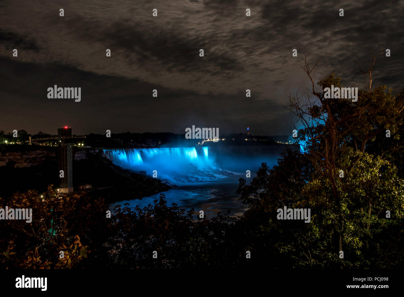 scenic night view of the Niagara Falls illuminated colorfull at night ...
