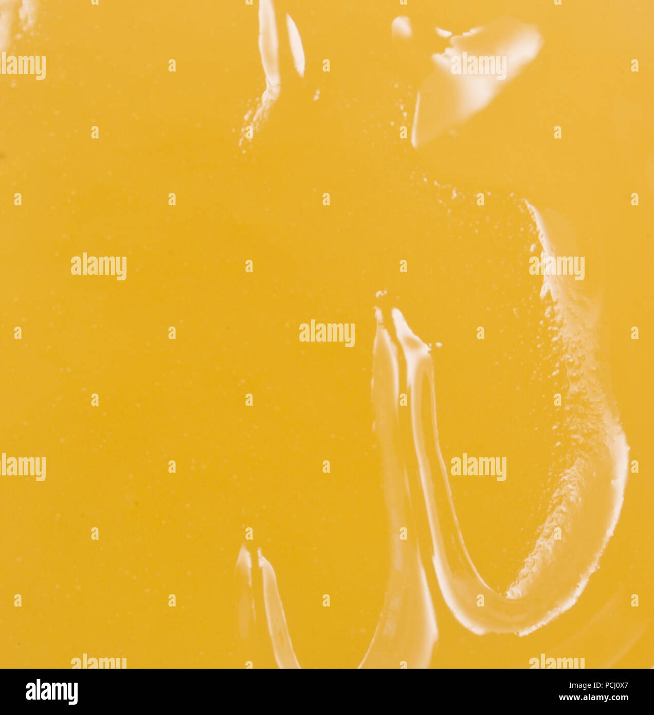 Liquid honey background Stock Photo - Alamy
