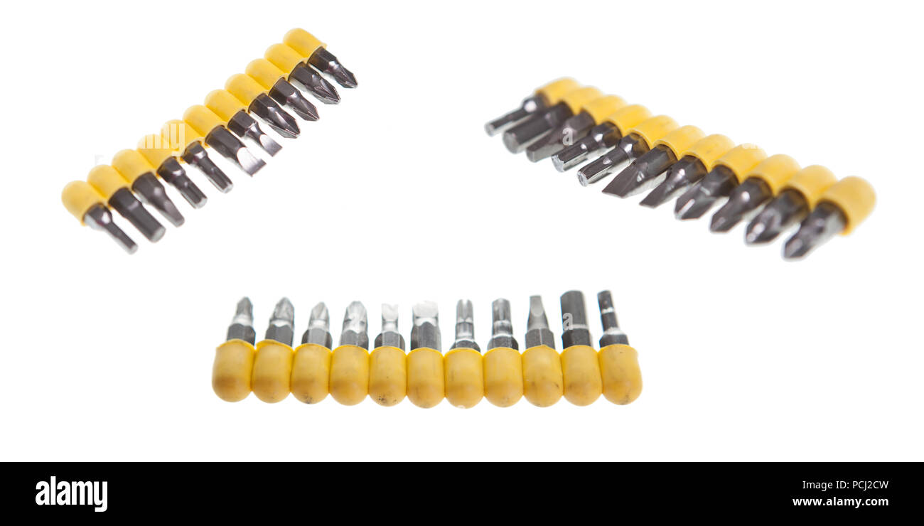 Heads for screwdriver. Bits. Tools on white background. Handyman tools ...