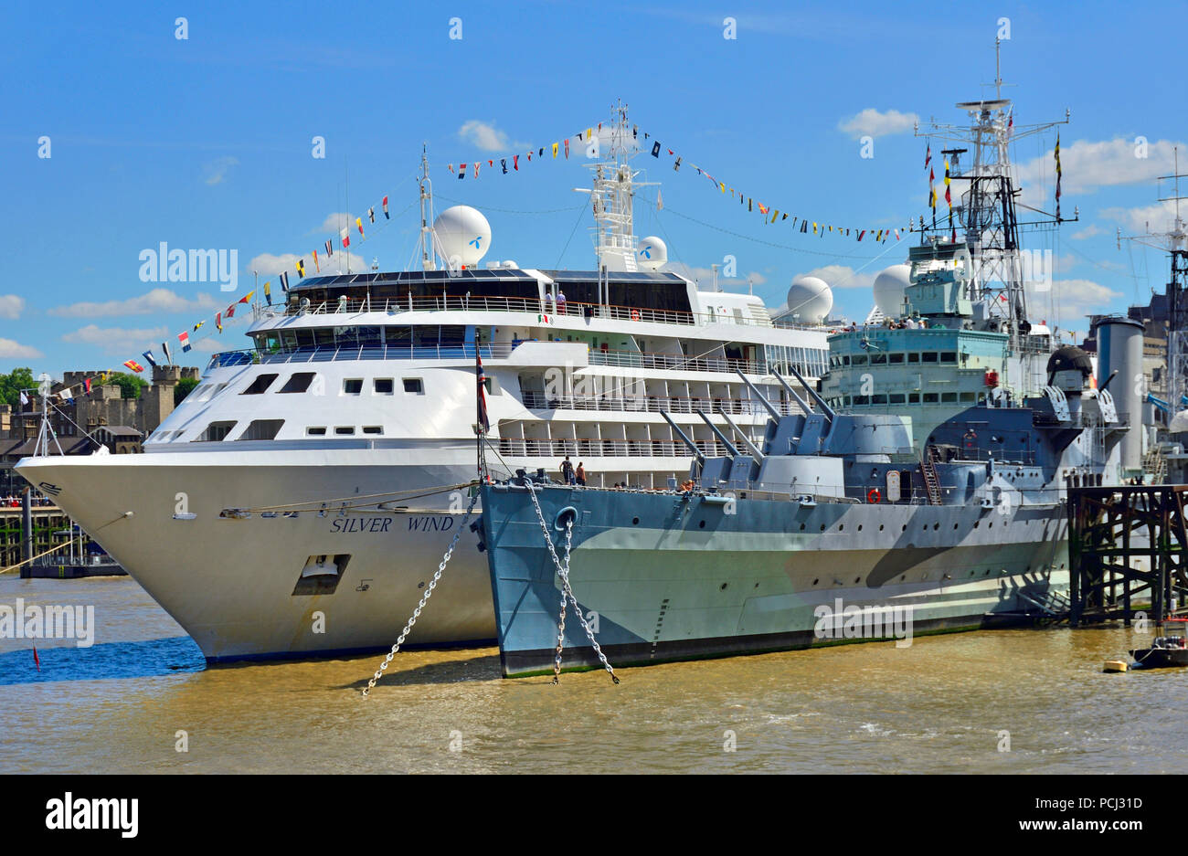 Silver Wind cruise ship moored next to HMS Belfast on the River Thames ...