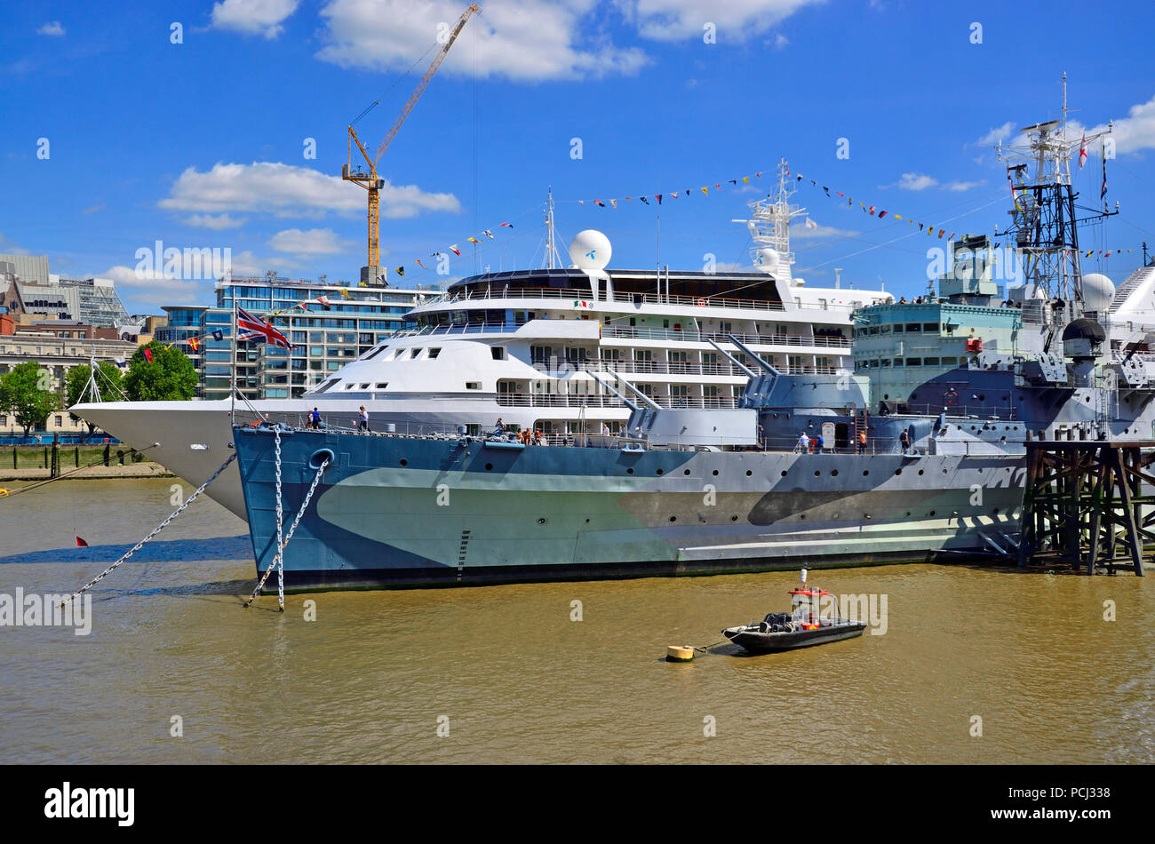 Silver Wind cruise ship moored next to HMS Belfast on the River Thames ...