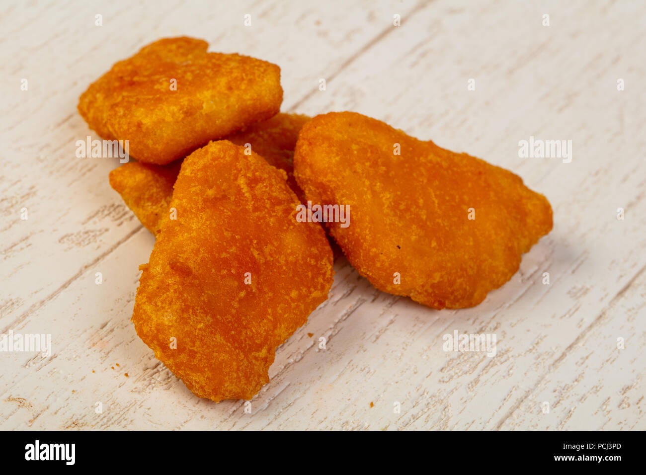 Crispy tasty golden chicken nuggets Stock Photo - Alamy