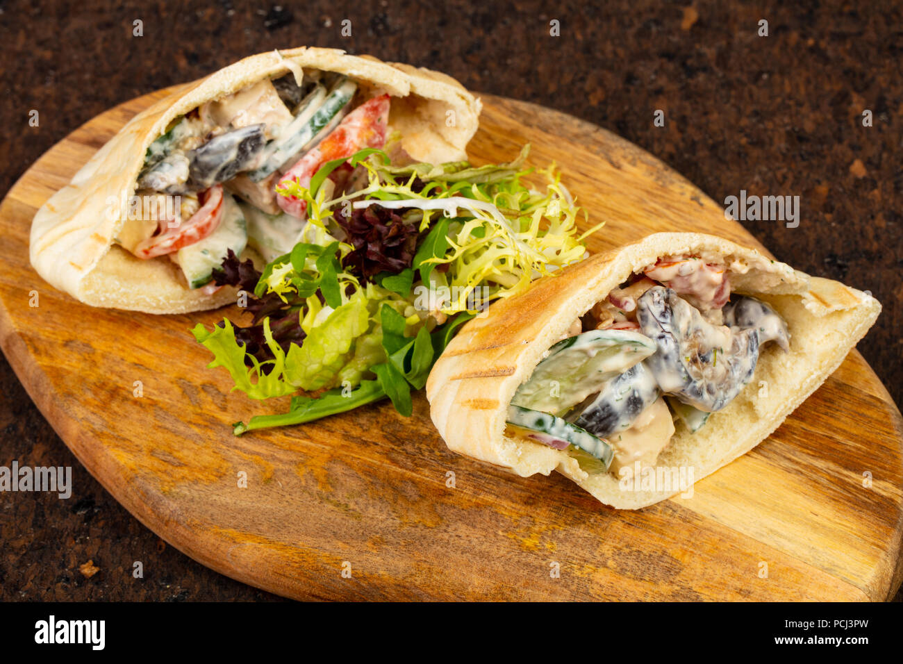 Delicious pita with vegetables and meat Stock Photo - Alamy