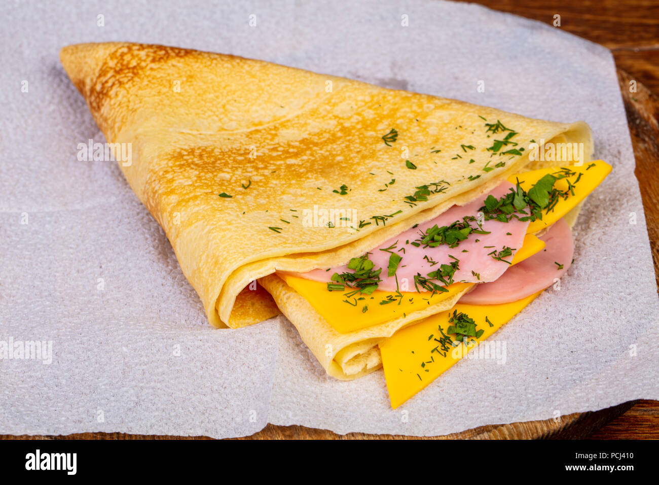Pancake with ham and cheese Stock Photo - Alamy
