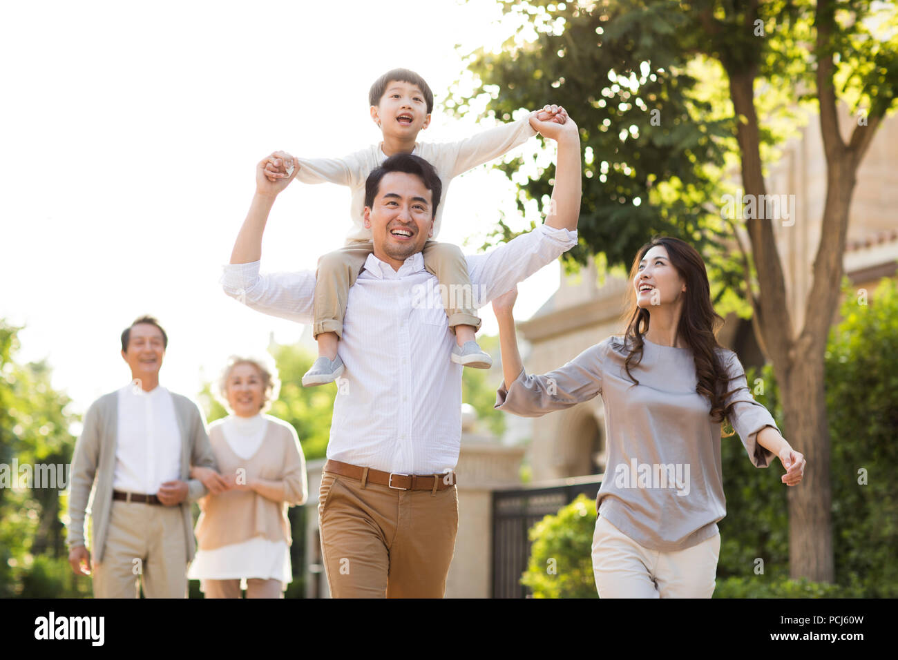4 people walking away hi-res stock photography and images - Alamy