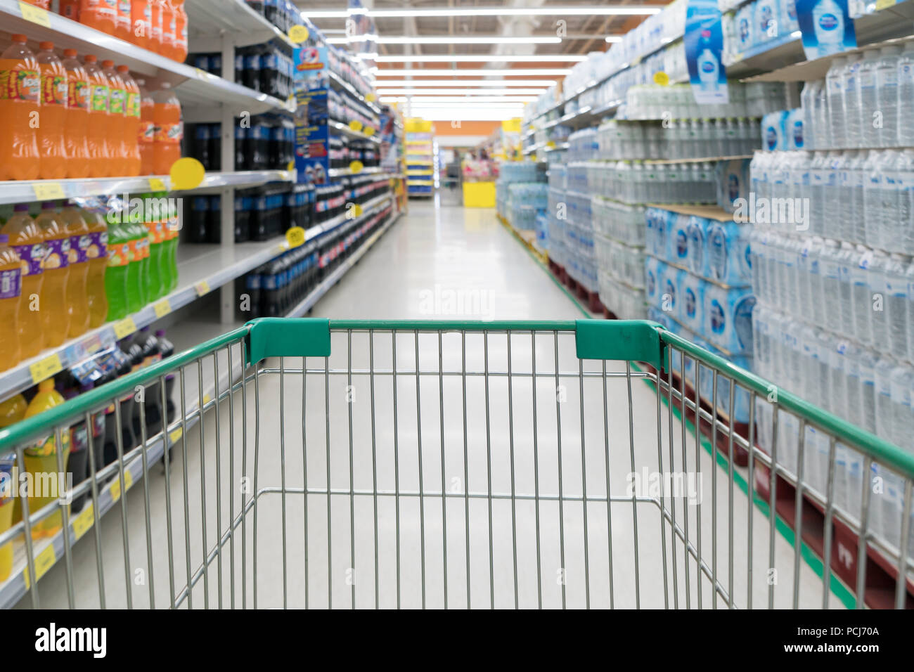 Abstract blurred photo of store with trolley in department store bokeh ...