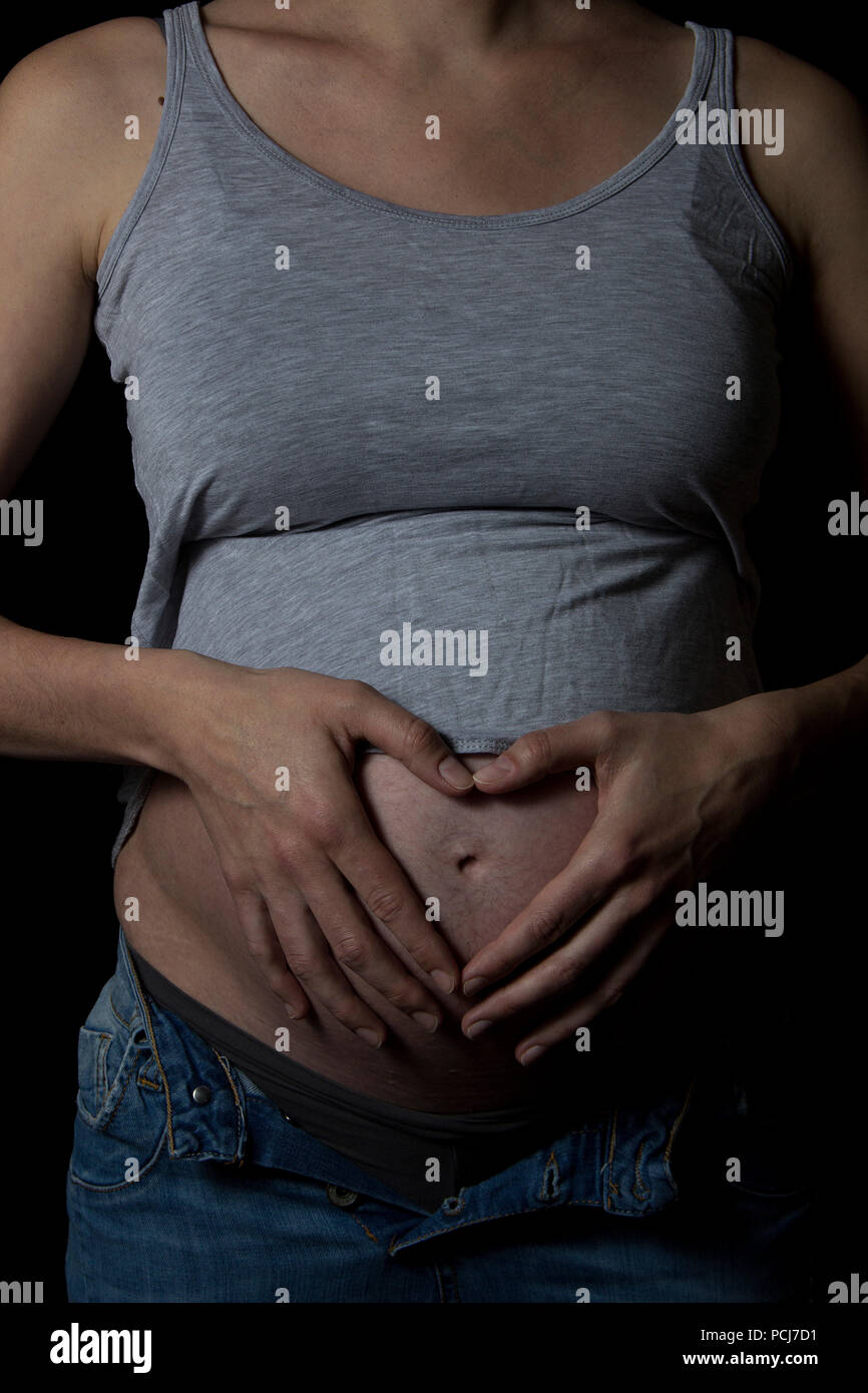 Babybelly hi-res stock photography and images - Alamy