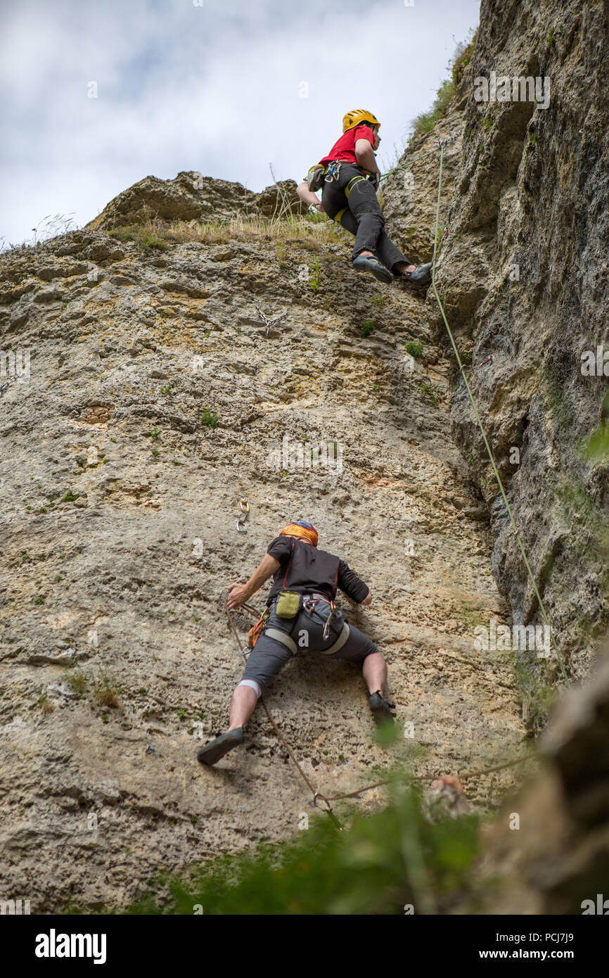 Two people rock climbing red hi-res stock photography and images - Alamy