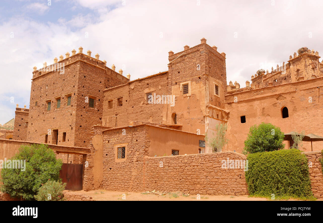 Beautiful old clay building called a kasbah in desert of Morocco, North ...