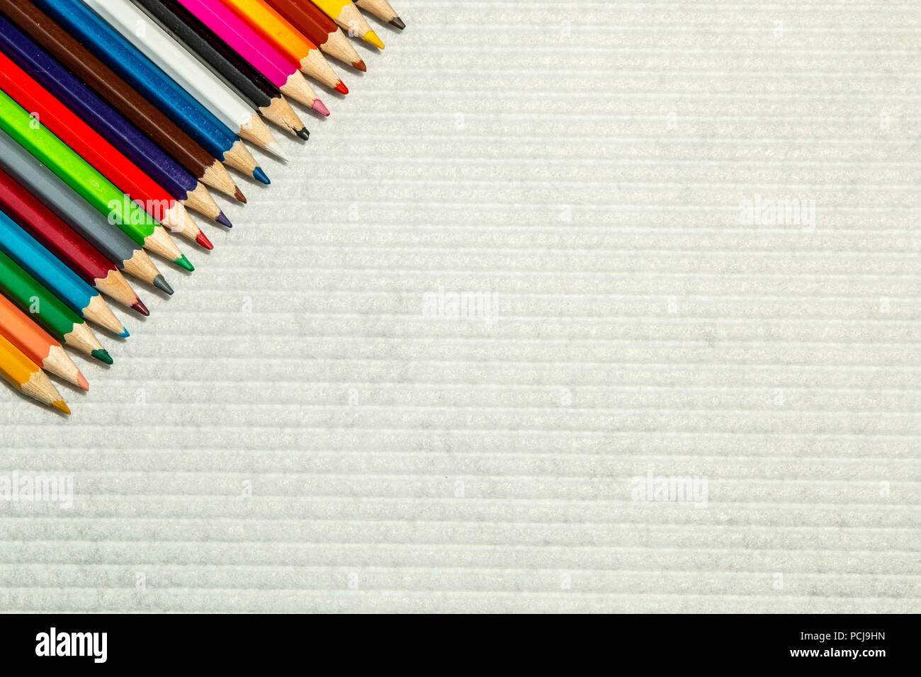 White background with colored pencils Stock Photo - Alamy